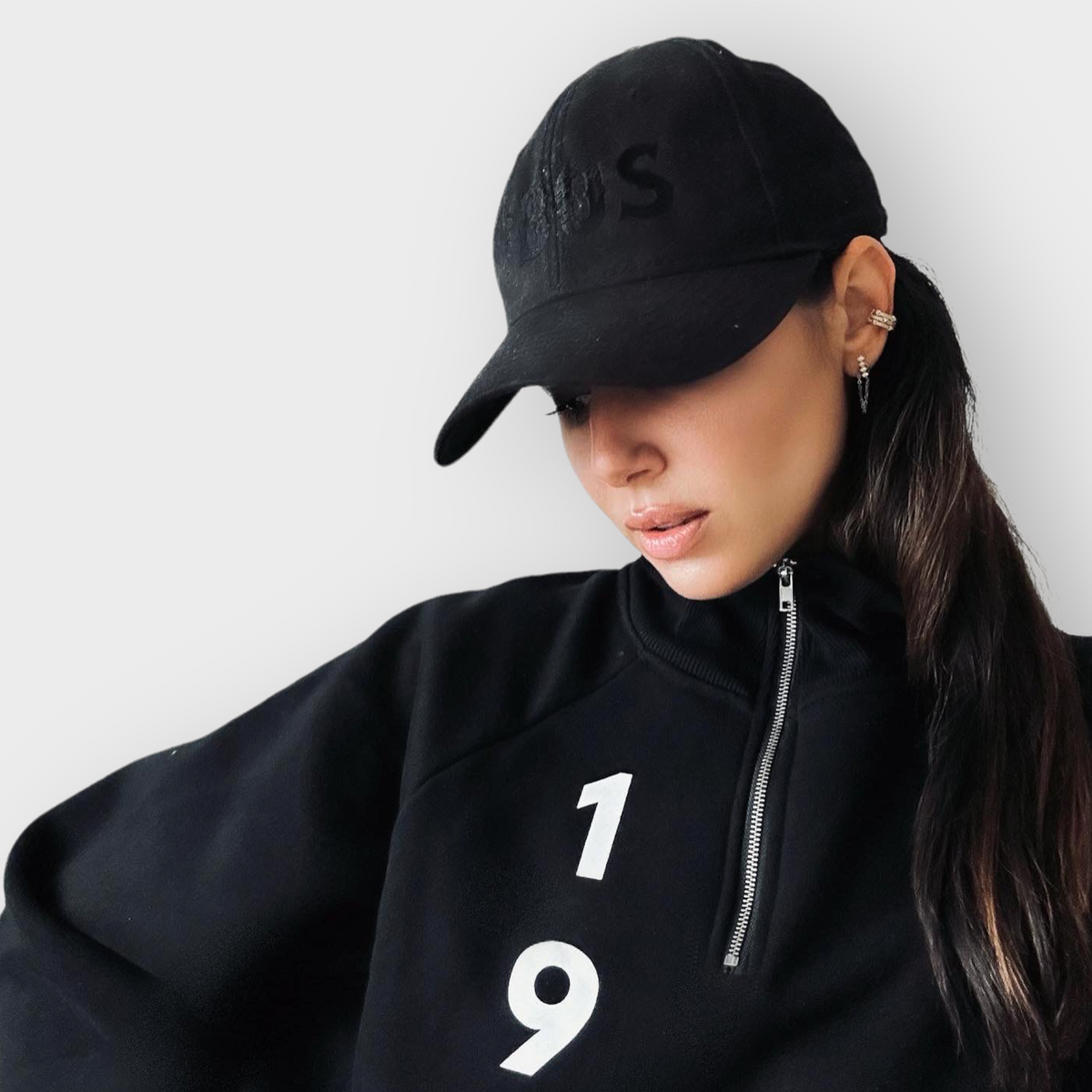 The Boston quarter zip in “blackout”