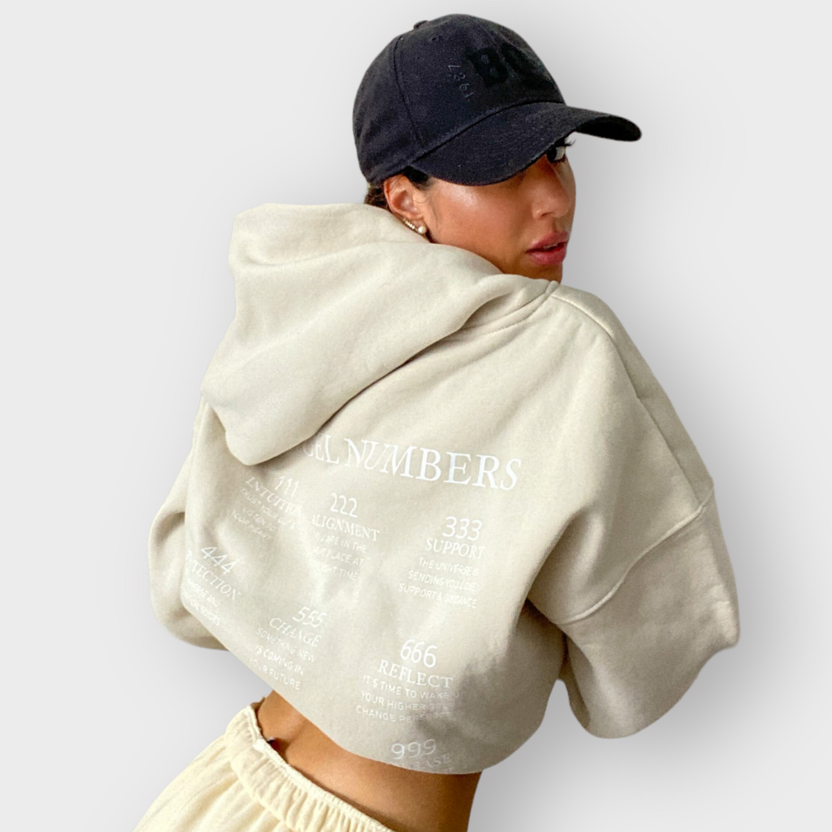 The angel number hoodie in "tahini"
